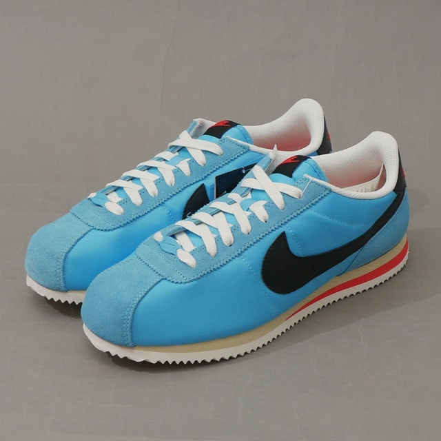 Blue nike cortez mens store