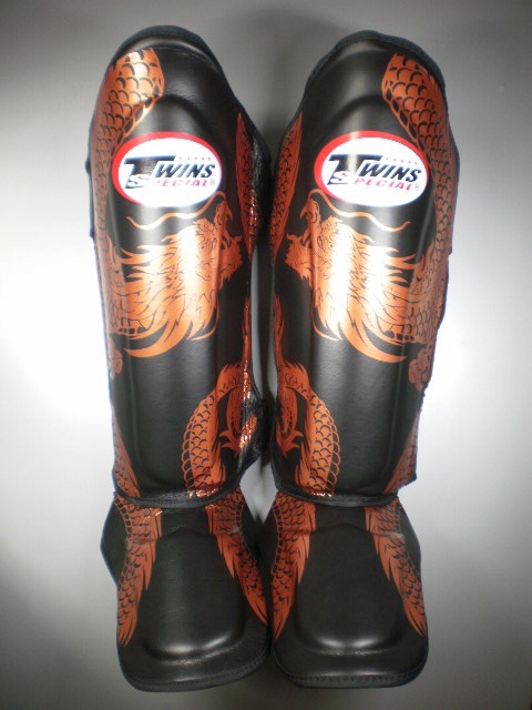 レガース（ツインズ）NEWドラゴン【黒／ブロンズ】 | レガース,ツインズ【NEWドラゴン】 | | ムエタイショップ TEAM DEVIL666