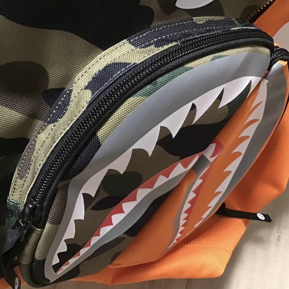 ★新品★ BAPE SHARK DAY PACK 1st camo green × orange a bathing ape backpack ...