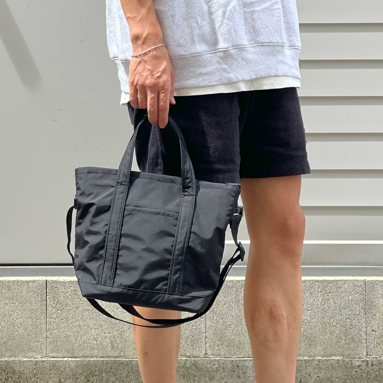 ERA. イーラ ERA'S WALK CARRIER "SANPO" GROCERY ナイロントートバッグ Sサイズ ブラック